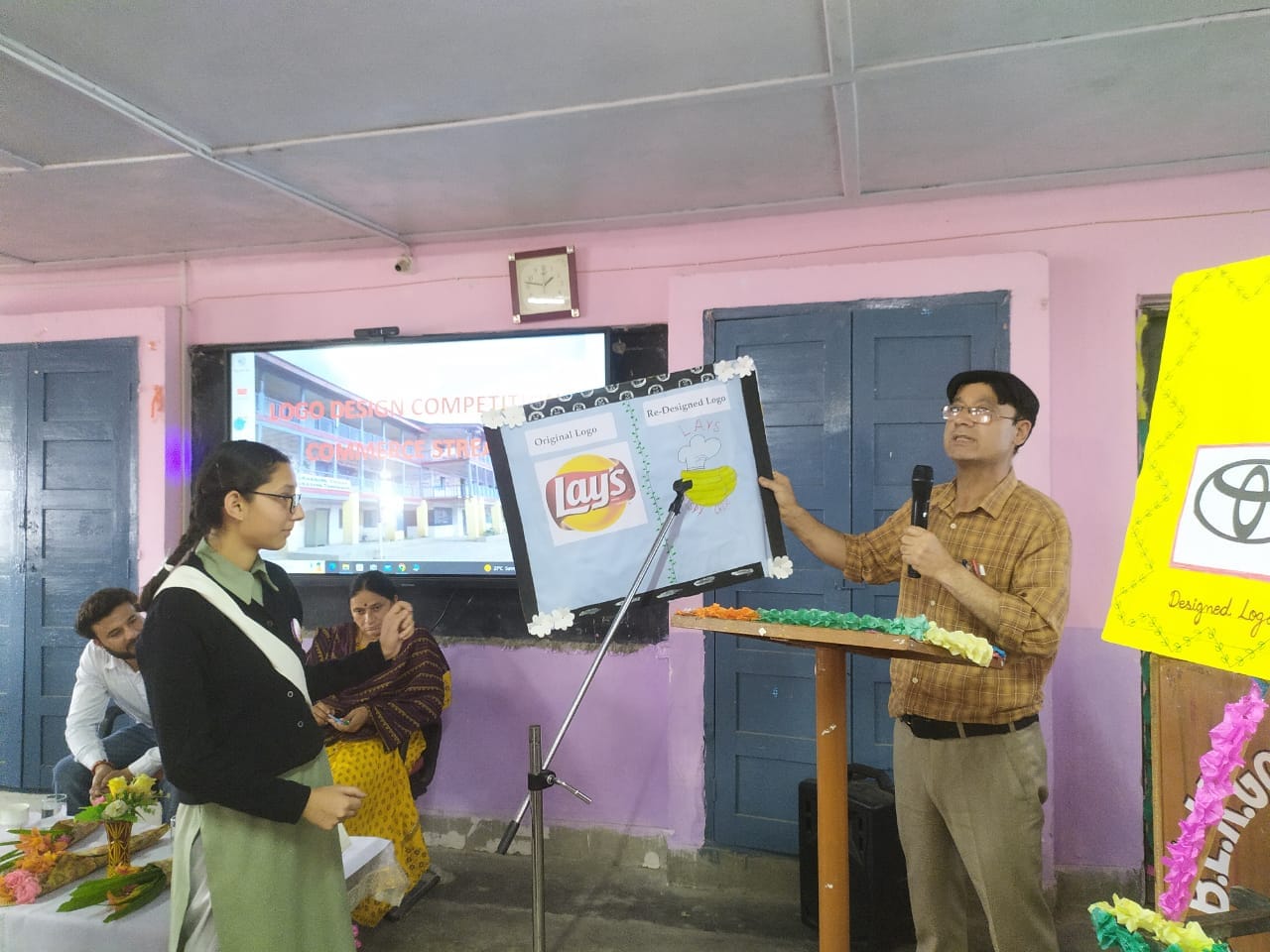 Aastha-aarushi Received Award For Excellent Performance In Logo Design ...