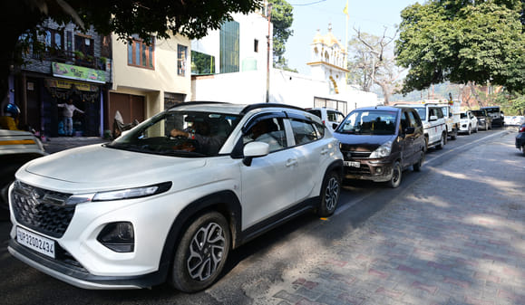 The Beauty Of A Snowy Spring, With A Line Of Vehicles Stretching From ...